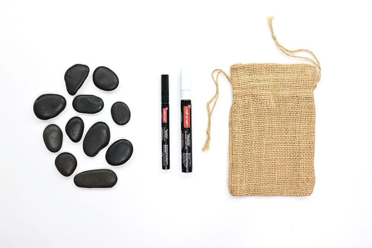 Bag of Bones Halloween Painted Rocks | Skeleton Rock Painting