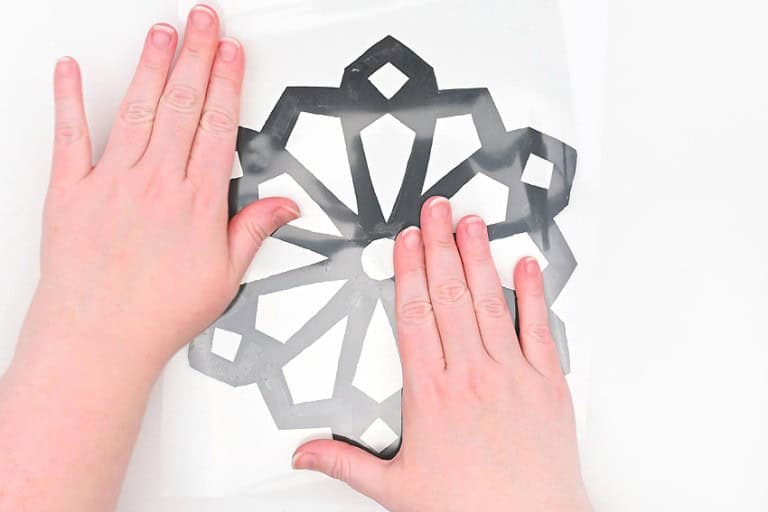 "Stained Glass" Snowflake Suncatcher | Paper Snowflake Craft