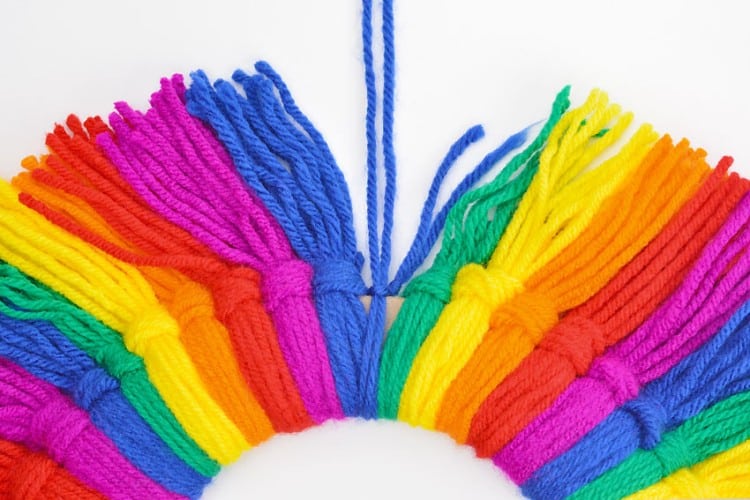 Rainbow Tassel Wreath | DIY Rainbow Wreath with Yarn Tassels