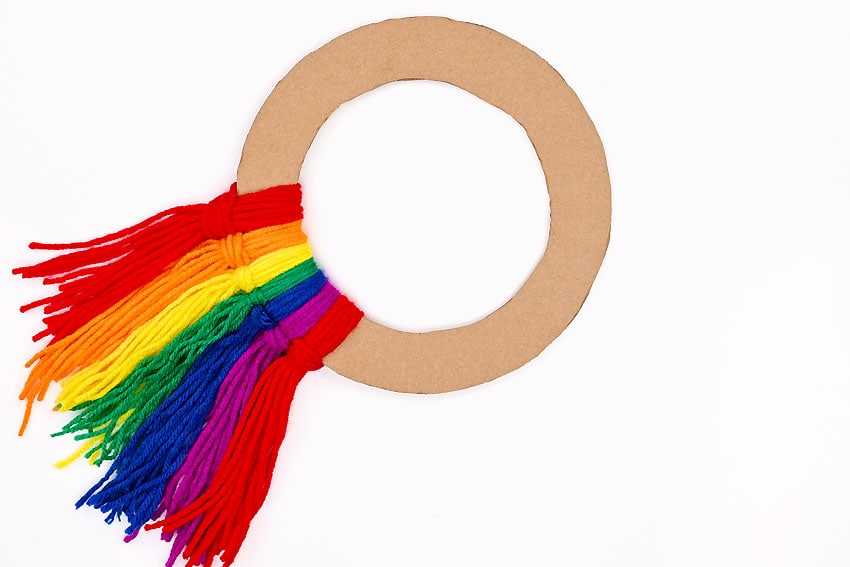 Rainbow Tassel Wreath | DIY Rainbow Wreath with Yarn Tassels